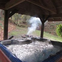 PRISCILLA'S COTTAGE BY THE FALLS by Tranquil Retreat Cabins